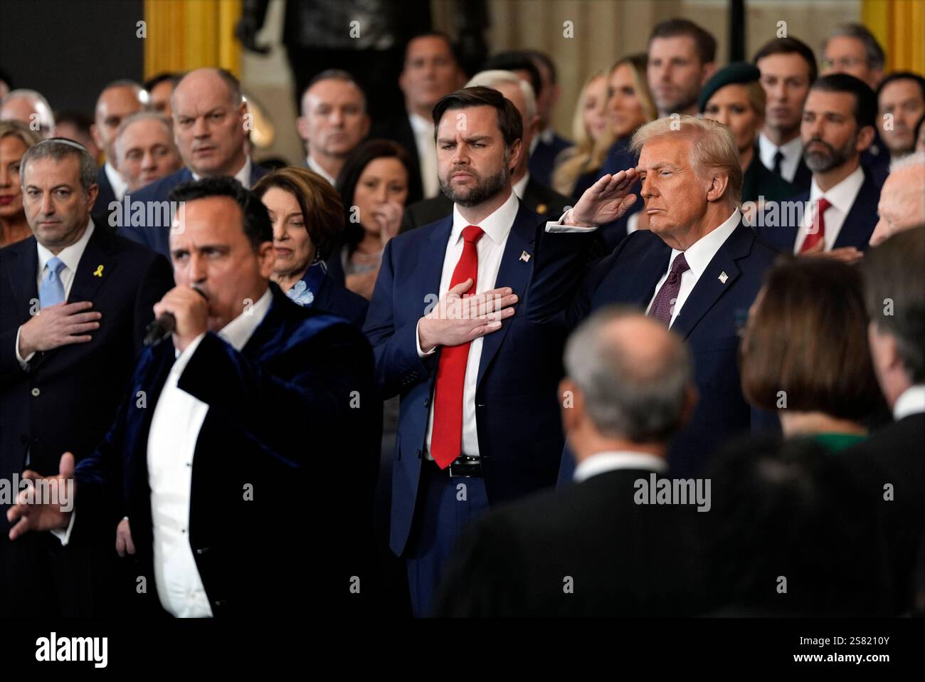 President Donald Trump and Vice President JD Vance listen to ...