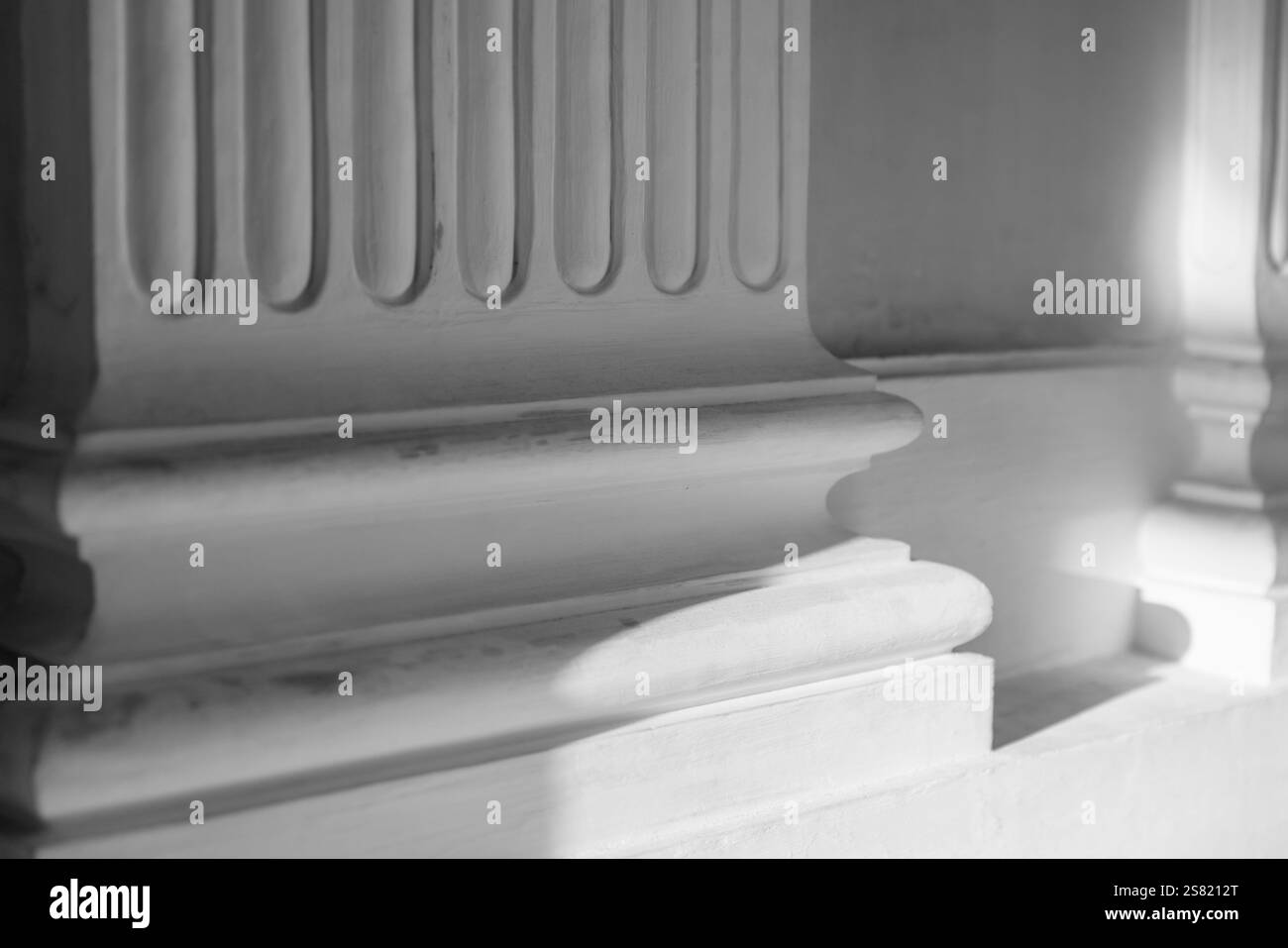 Classic luxury interior fragment, decorative pillar base with white ...