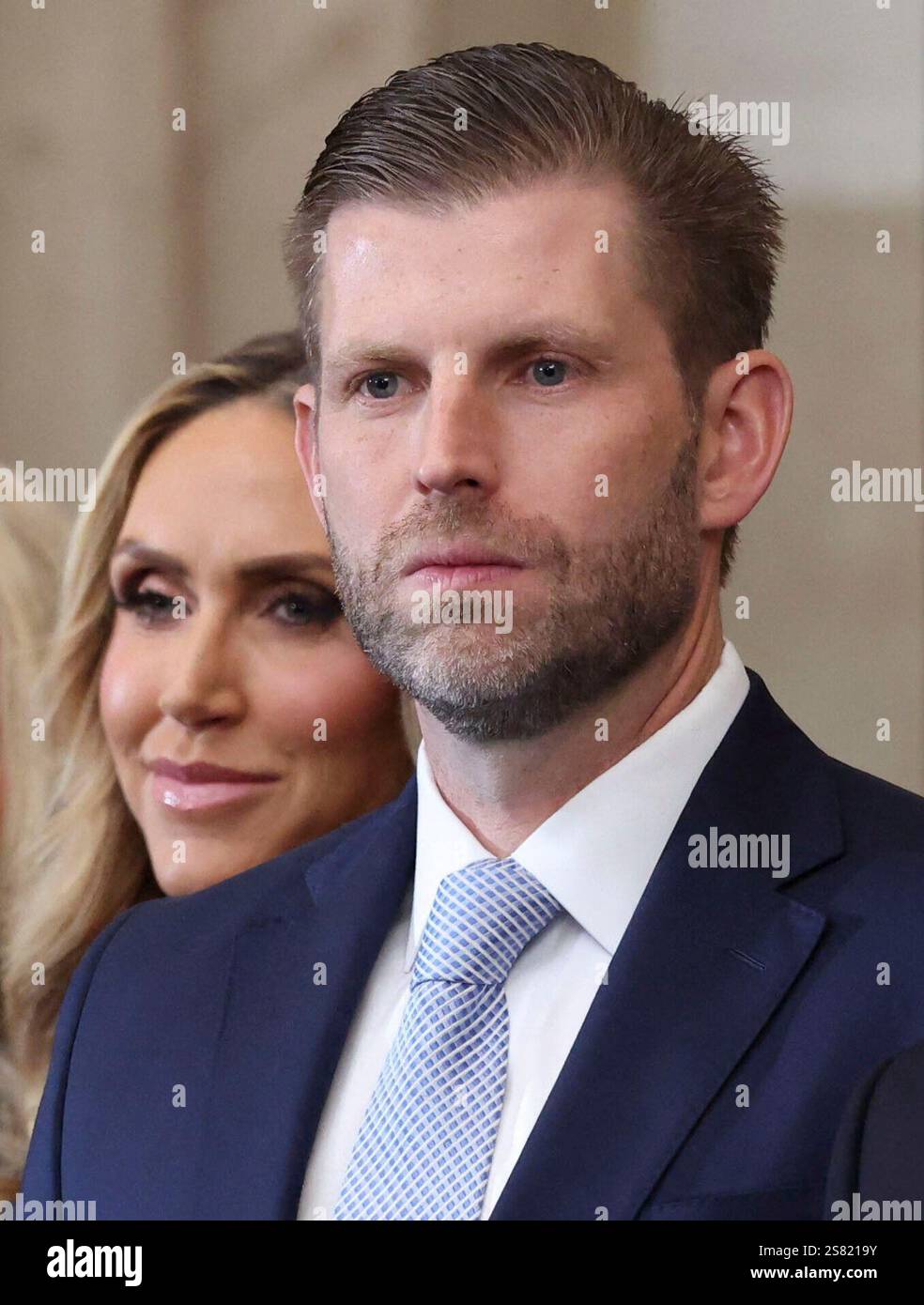 Eric Trump and Laura Trump stand on the day of the Presidential ...