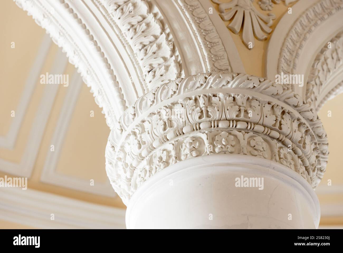 Classical portico fragment with decorated pillar top. Antique ...