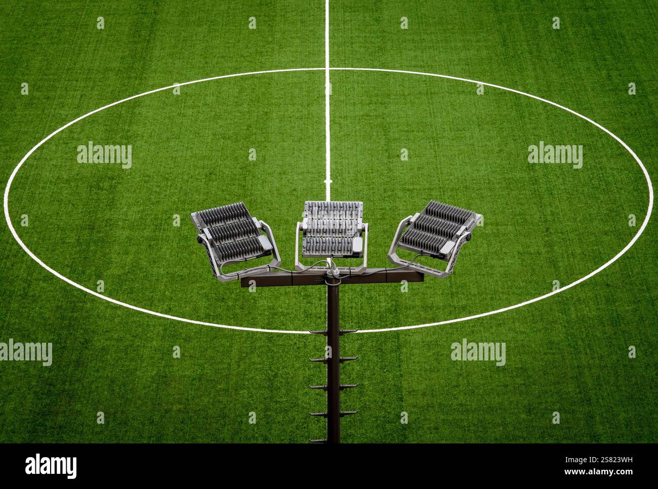 Center of the football pitch and sports area lights from above, soccer ...
