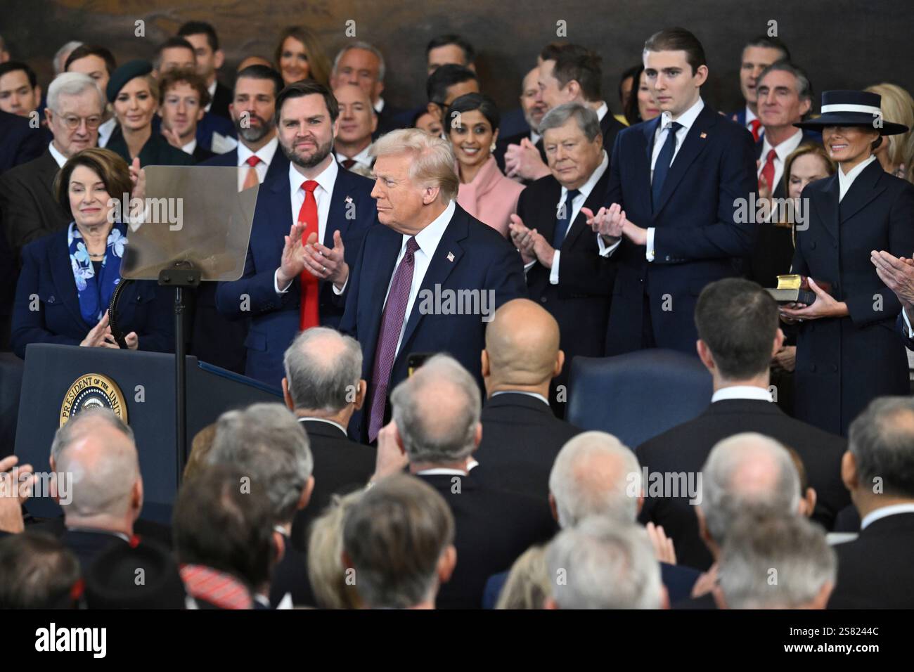 Donald Trump walks to the lectern after being sworn in as the 47th US ...