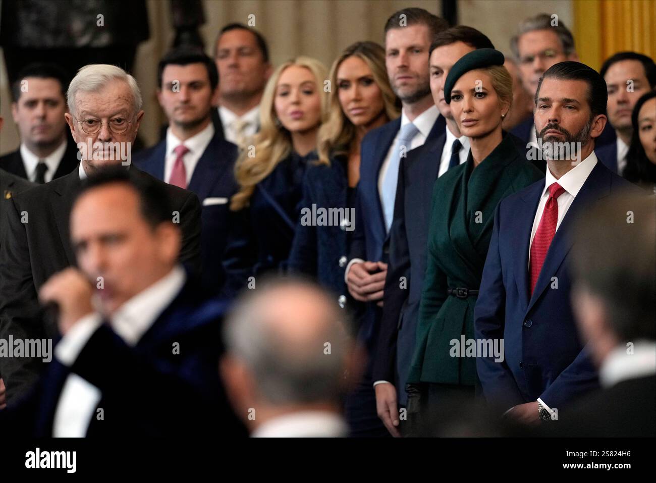 Members of the Trump family listen as Christopher Maccio sings during ...