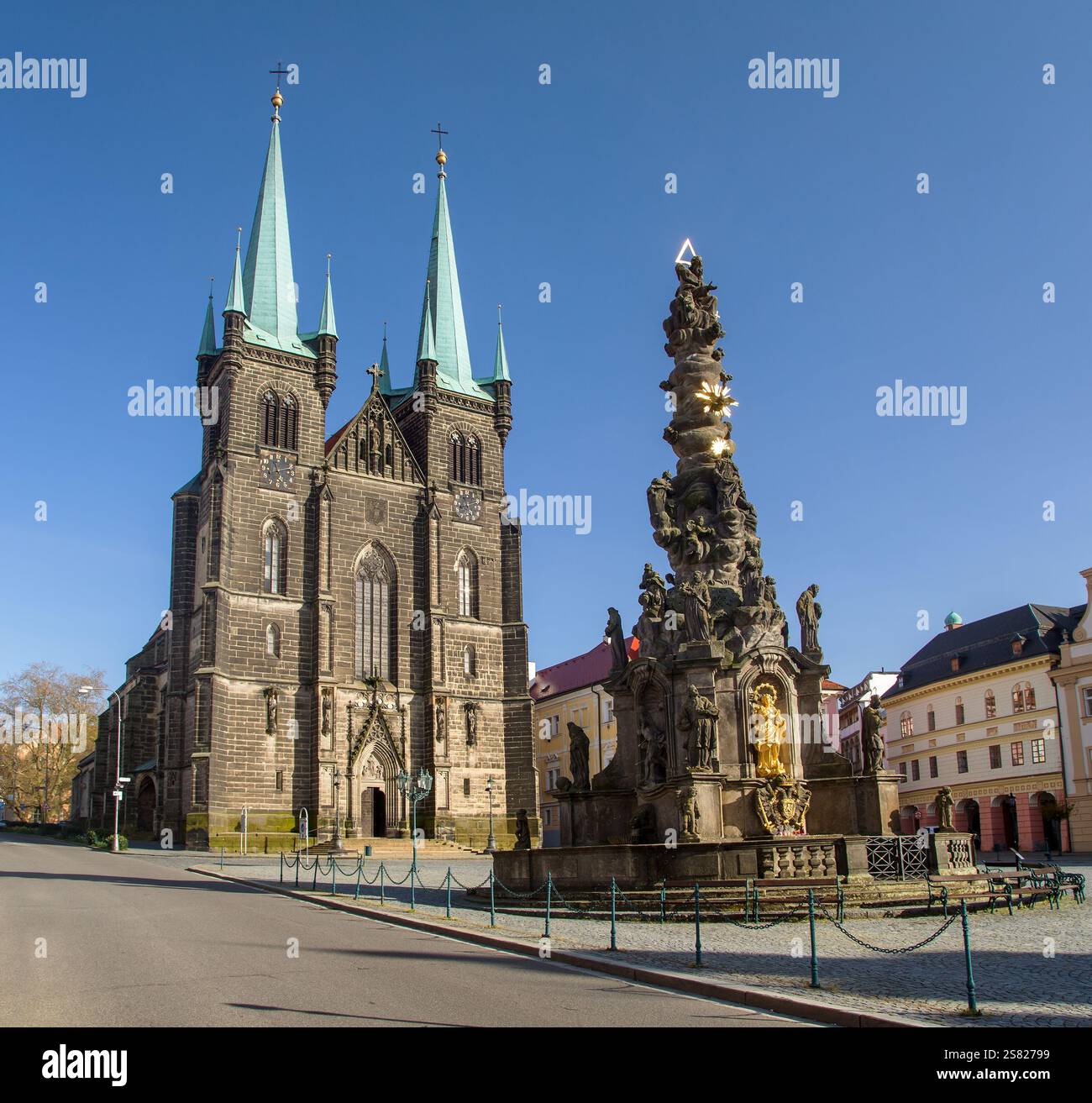 Frontage of the Church of the Assumption of the Virgin Mary and plague ...