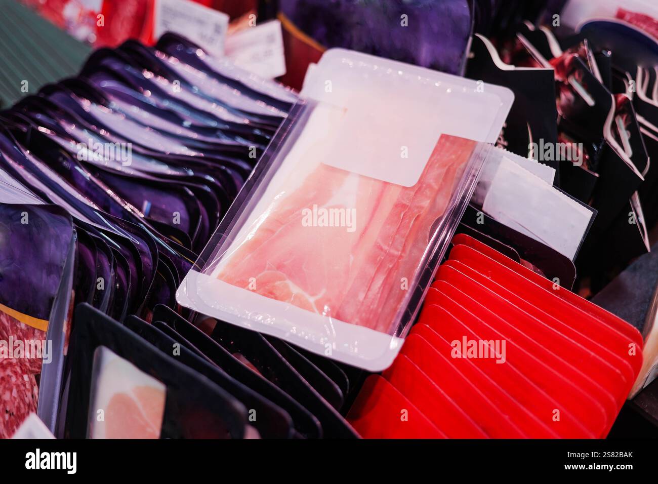 Spanish sliced jamon meat in vacuum package at store Stock Photo - Alamy