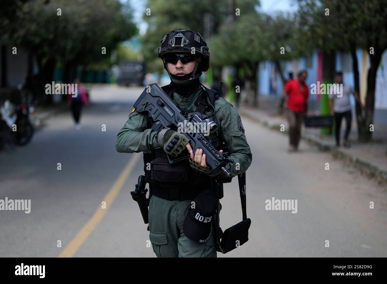 Police patrol in Tibu, Colombia's northeastern Catatumbo region, Monday ...