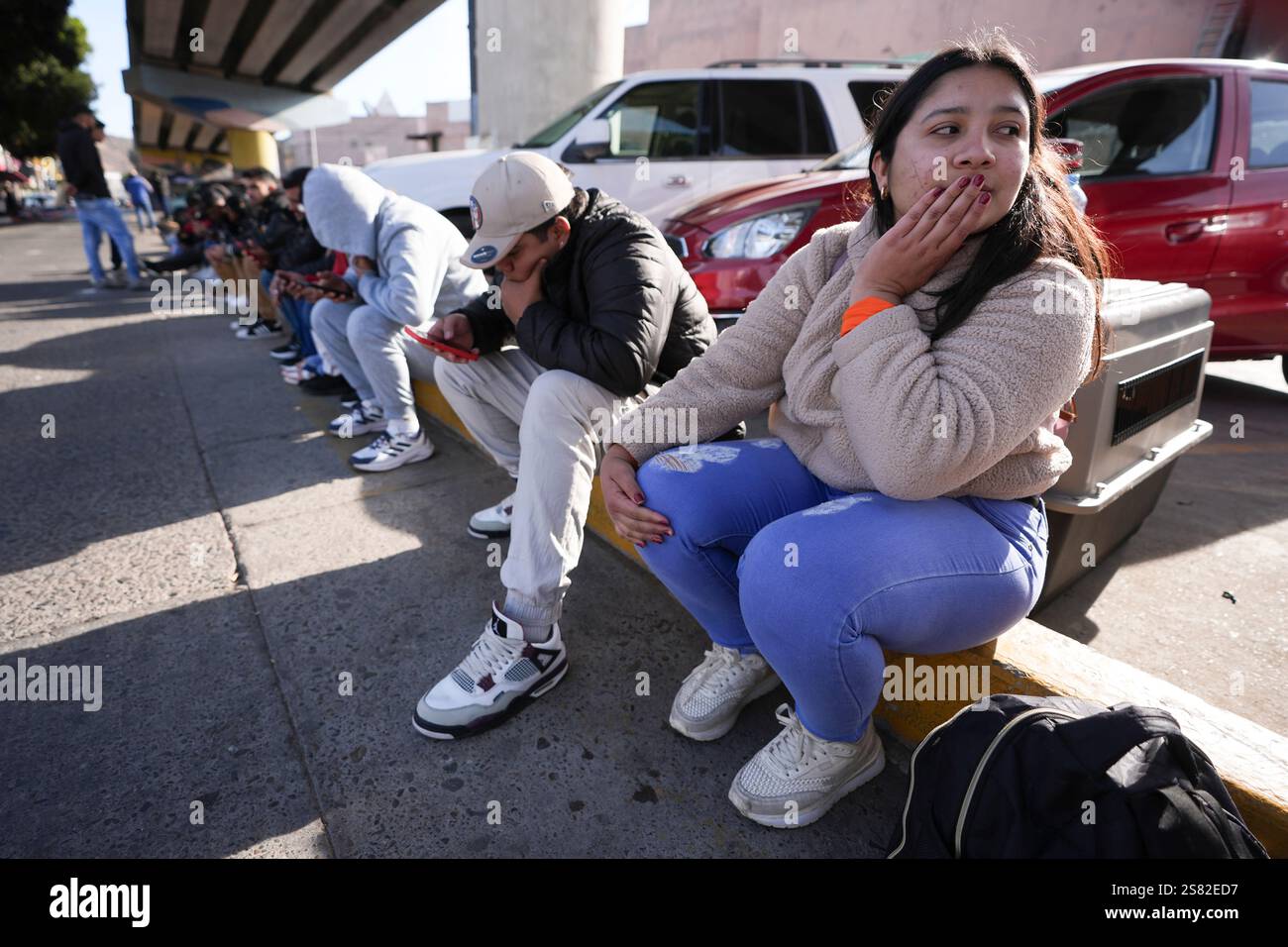 Melanie Mendoza of Venezuela, gets emotional as she sees that her 1pm appointment was canceled ...