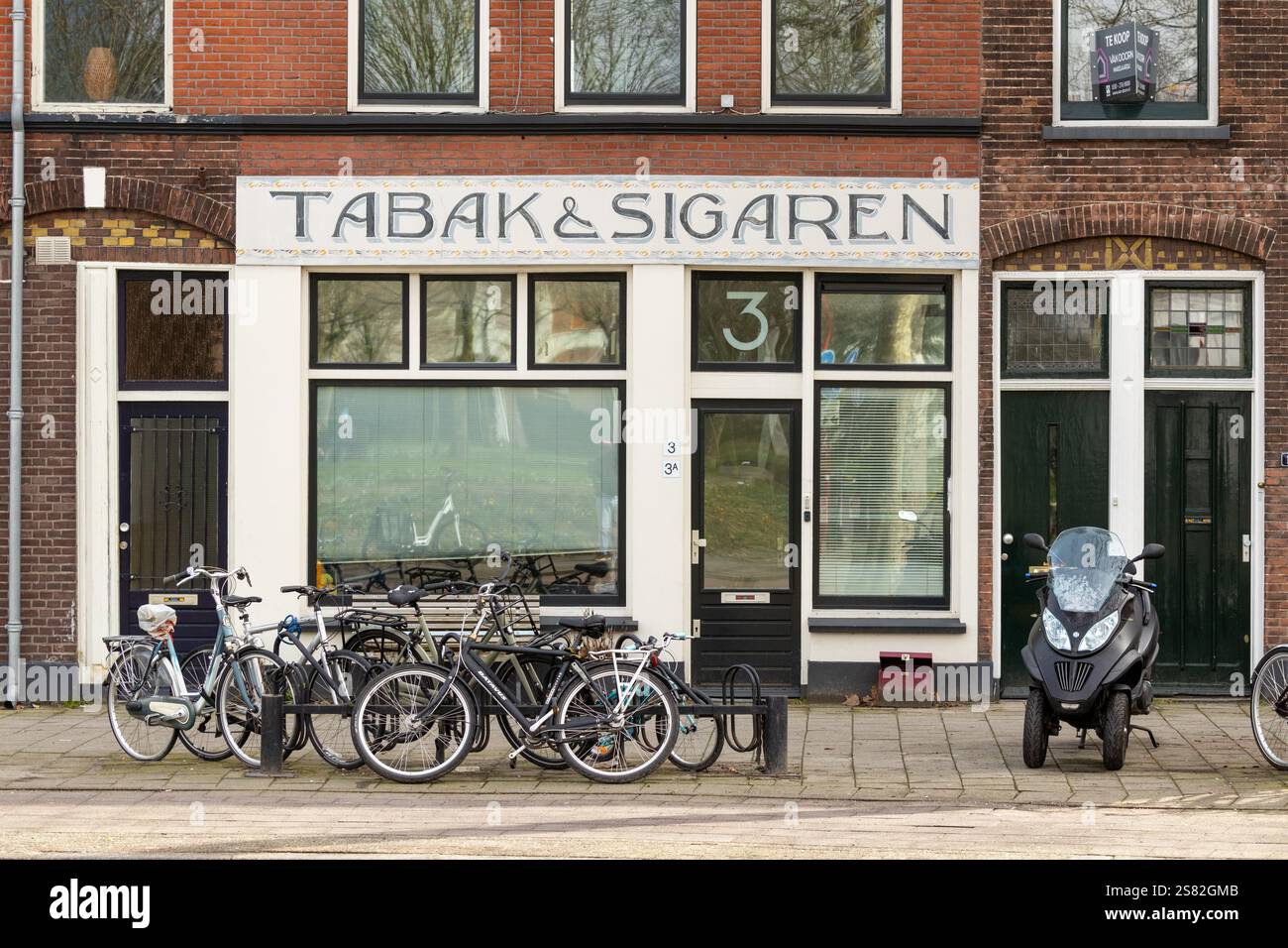 Old Tobacco and Cigars lettering on a facade in typical Dutch scenery ...