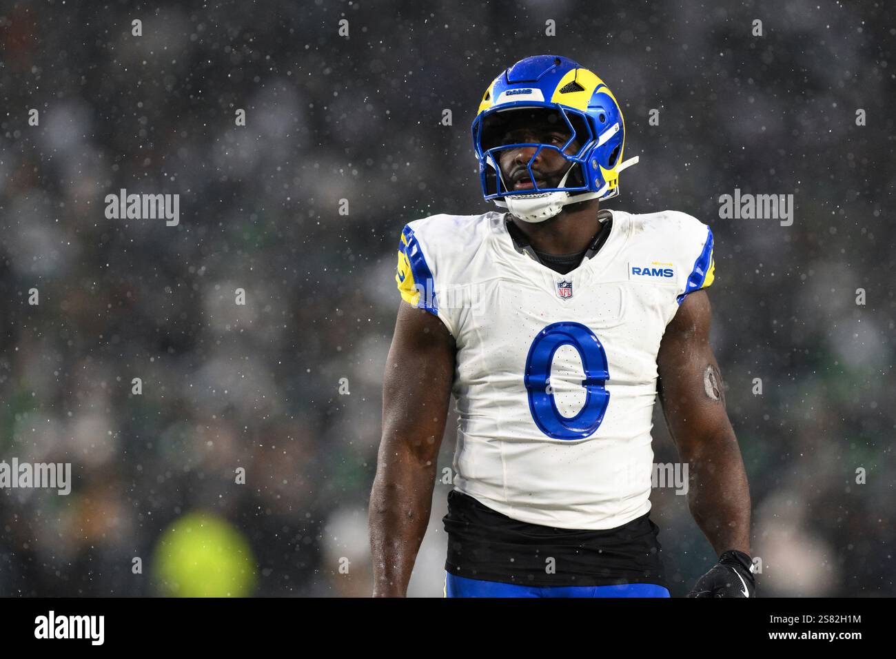Los Angeles Rams linebacker Byron Young (0) looks on between plays ...