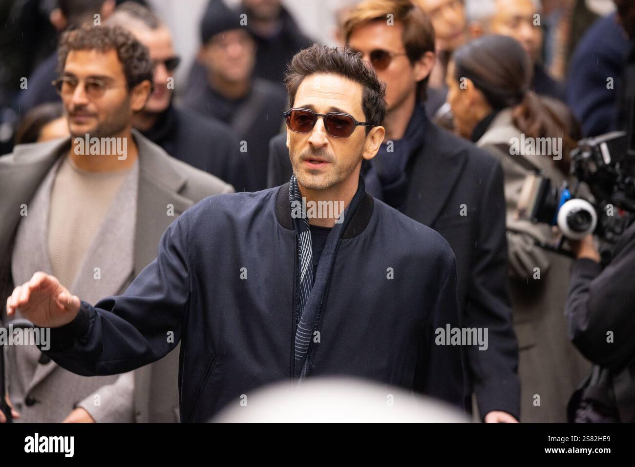 Adrien Brody arrives at the Giorgio Armani fashion show during the ...