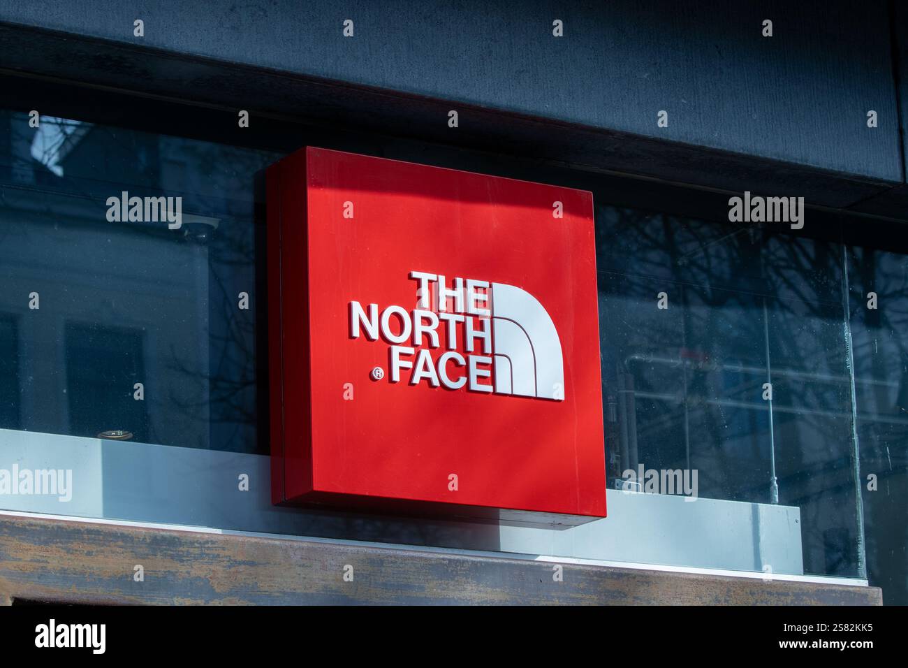 The North Face logo sign above the shop. The North Face produces ...