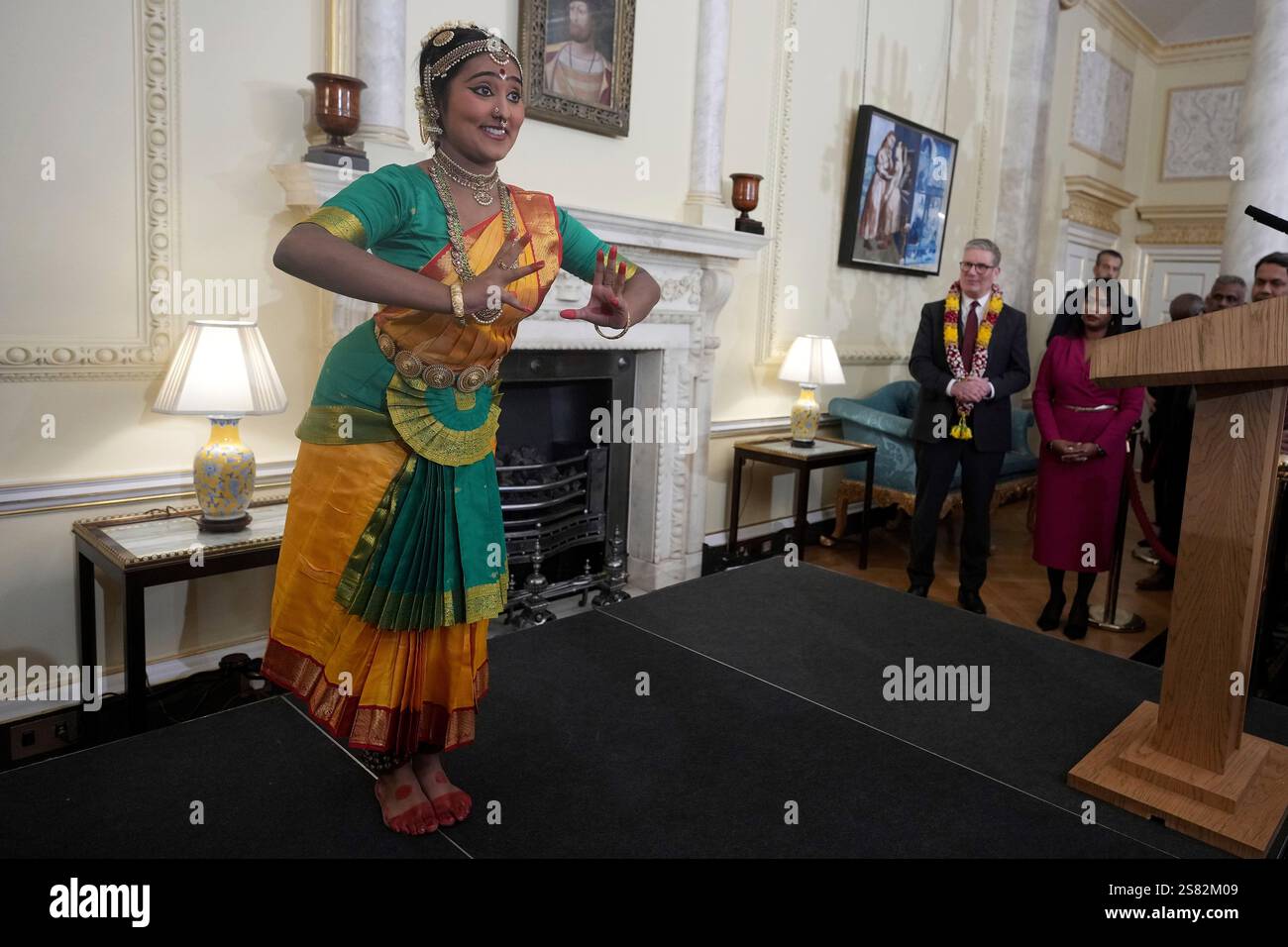 Britain's Prime Minister Keir Starmer watches a dancer performing ...