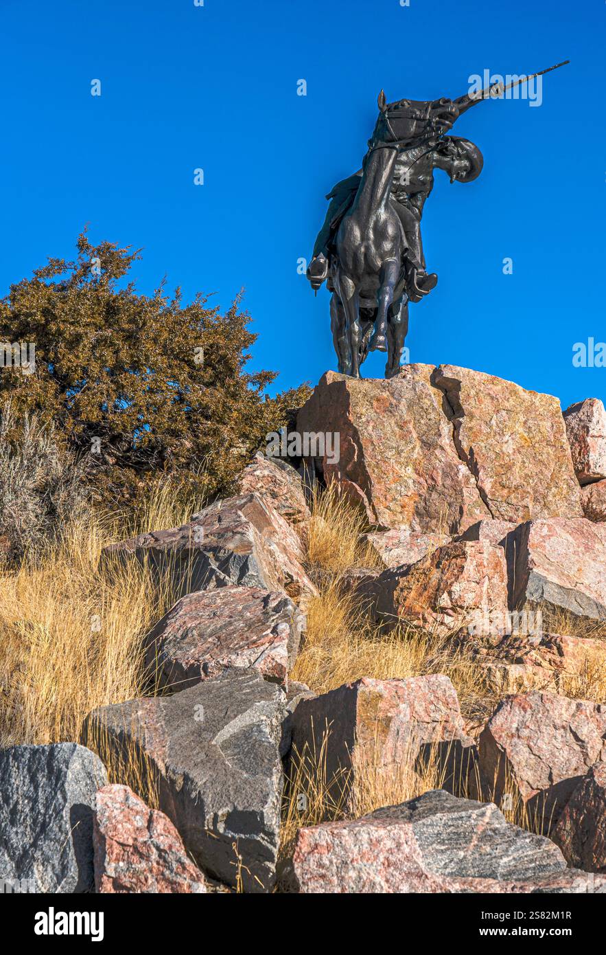 Buffalo Bill Cody The Scout on horse bronze statue on rock formation ...