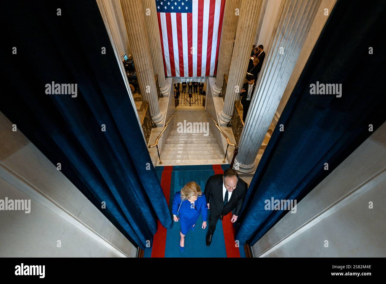 NYTINAUG25 -- Jill Biden and Doug Emhoff entering the stage as the ...