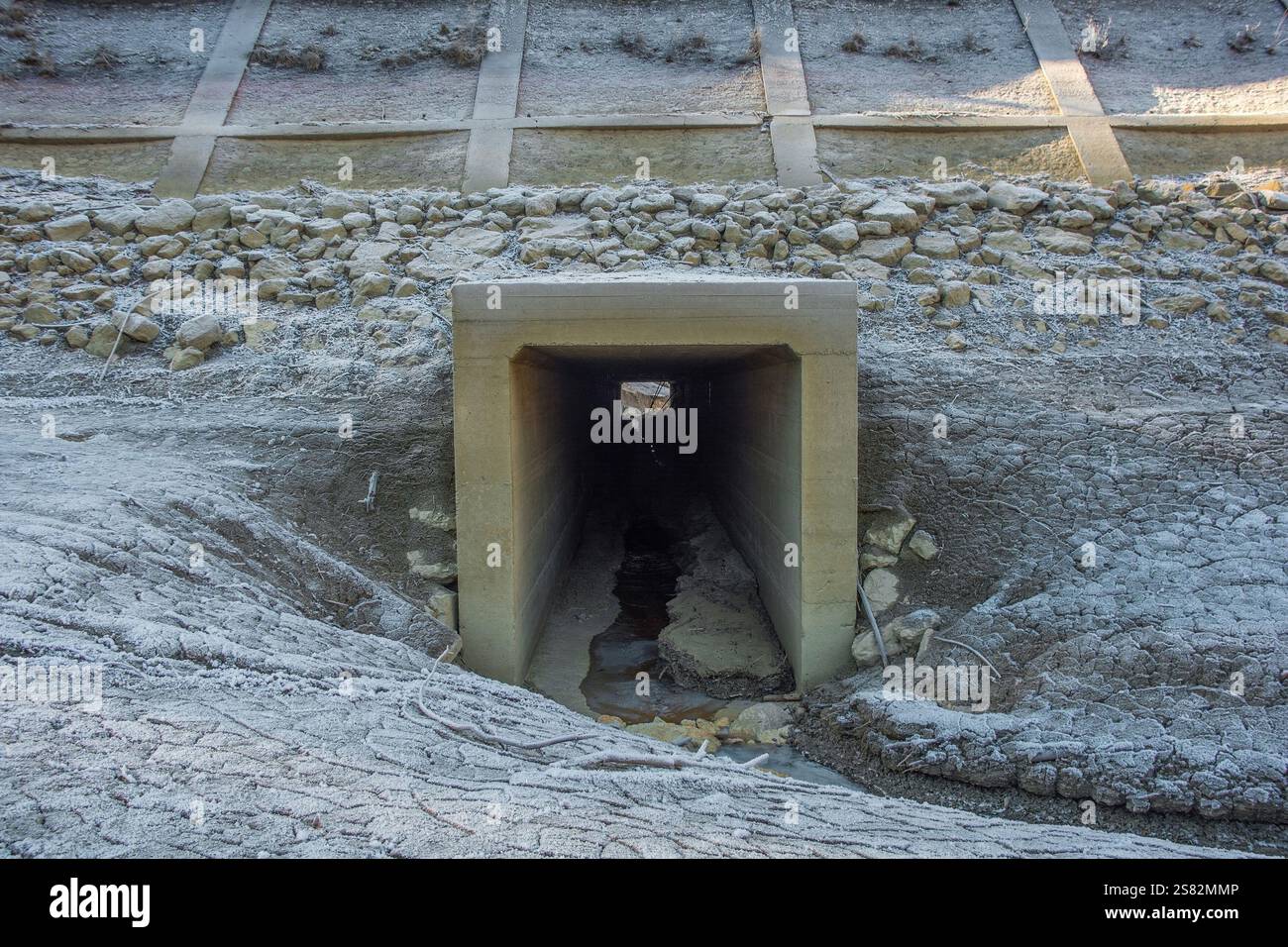 A reinforced concrete box culvert in a reservoir dam. Lago di Barcis ...