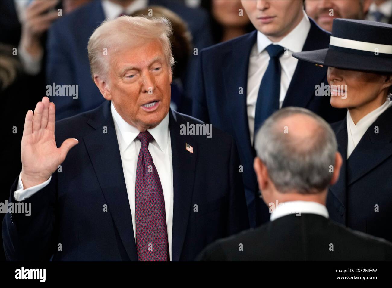 Donald Trump is sworn in as the 47th president of the United States by ...