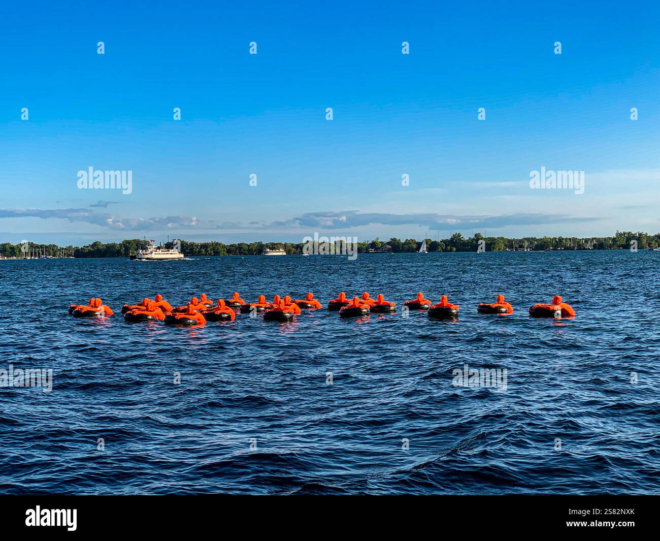 floating artwork with dummies in the water Stock Photo - Alamy