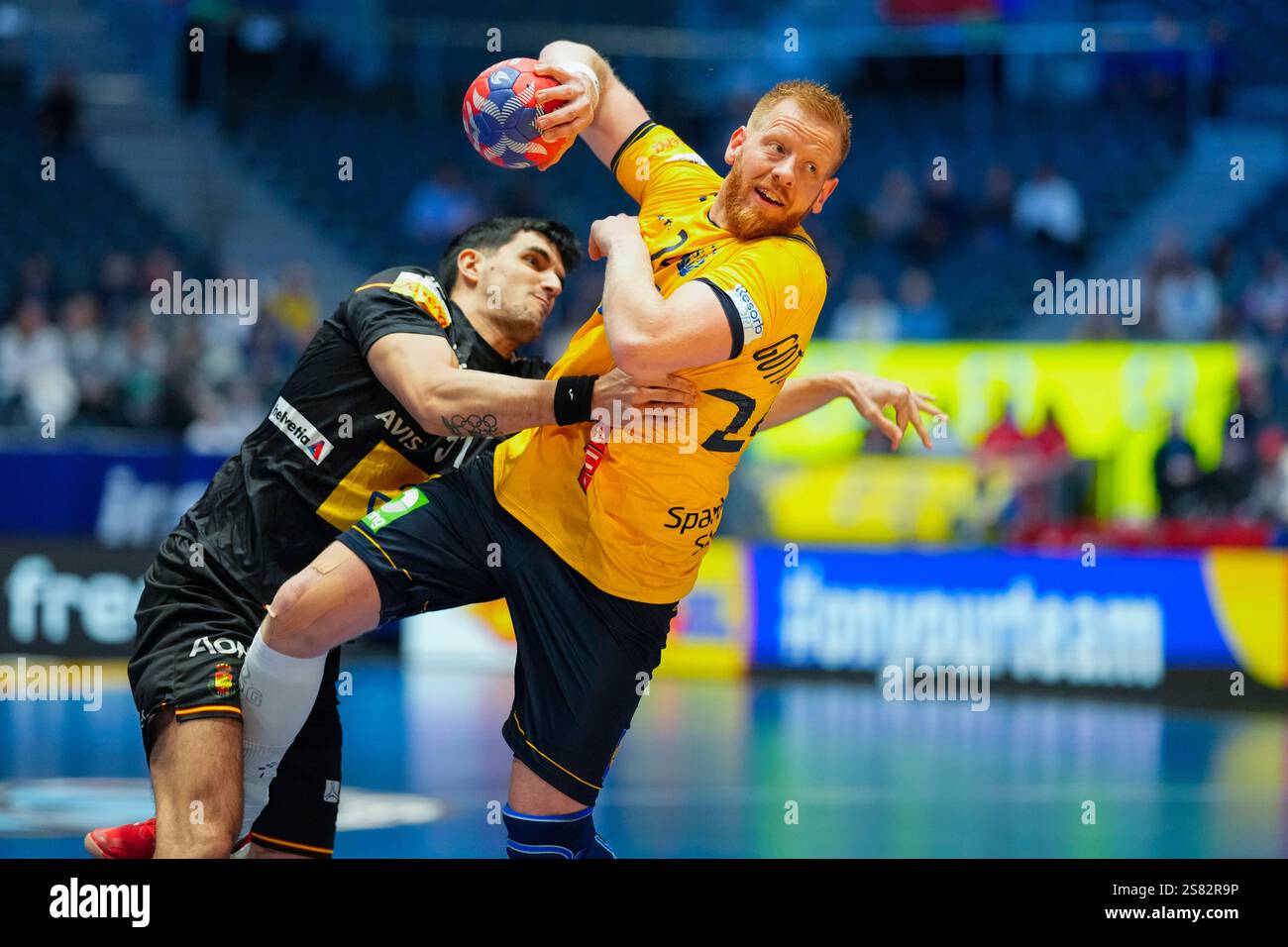 Spain's Miguel Sánchez Migallón Naranjo, left, challenges Sweden's Jim ...