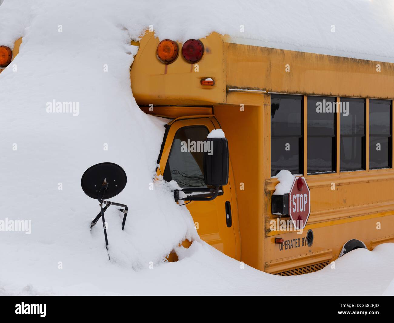 Snow Covered School Bus in Winter Snow Day Stock Photo - Alamy