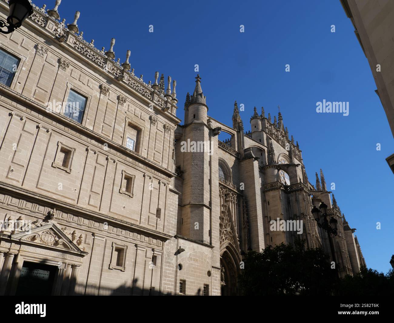 Facade of the cathedral Maria de la Sede in Seville Spain one of the largest churches in the ...