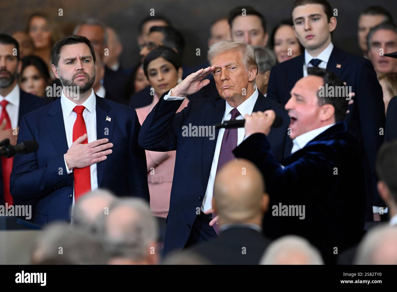 From left, Vice President JD Vance and President Donald Trump stand as ...