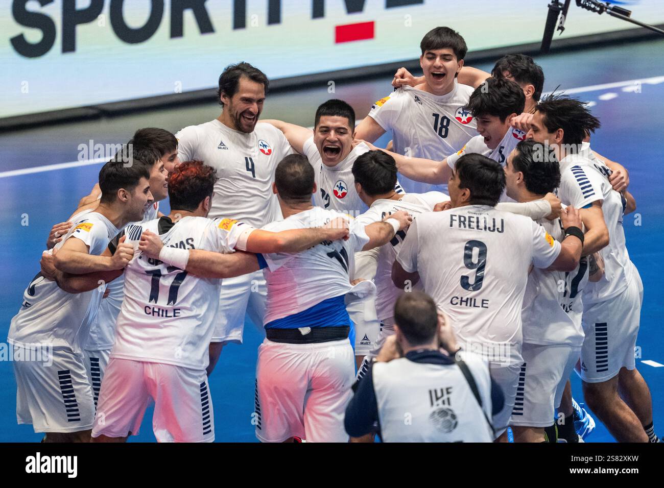 Players of, Chile. , . celebrate after the 2025 IHF World Men's ...