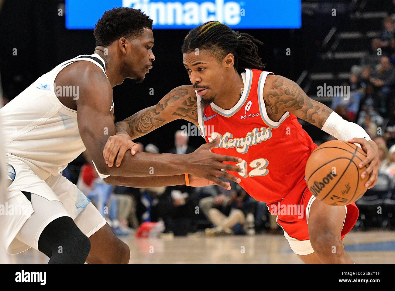 Memphis Grizzlies guard Ja Morant (12) handles the ball against ...