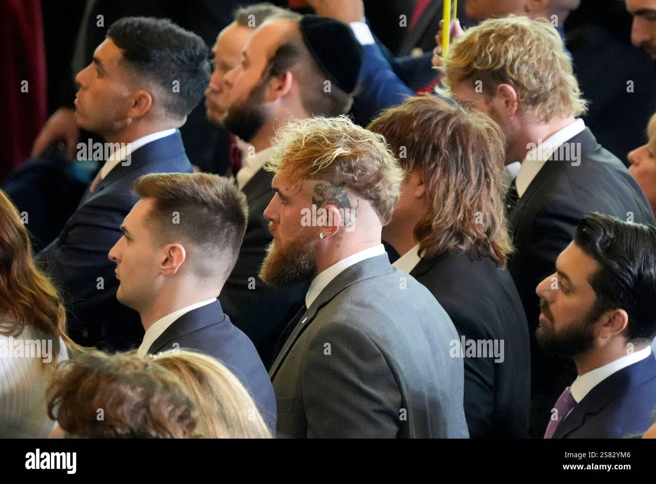 Jan 20, 2025; Washington, DC, USA; Jake Paul listens to President ...