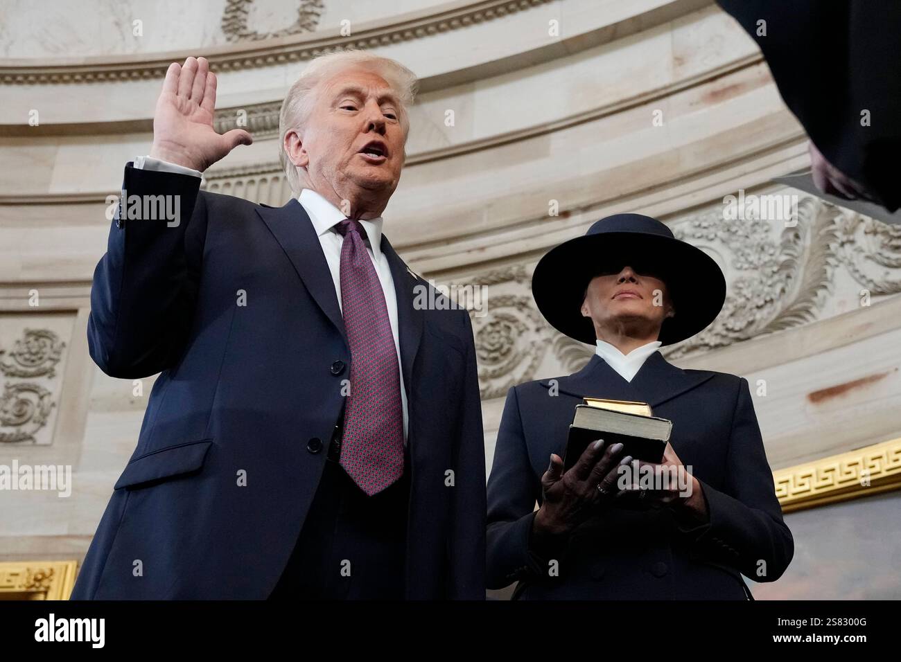 Donald Trump is sworn in as the 47th president of the United States by ...