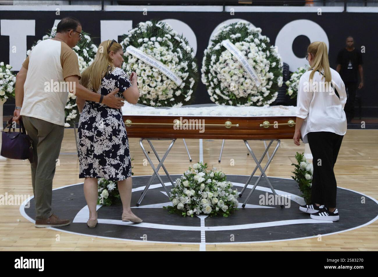 Fans, friends and family bid farewell to Brazilian journalist Leo ...