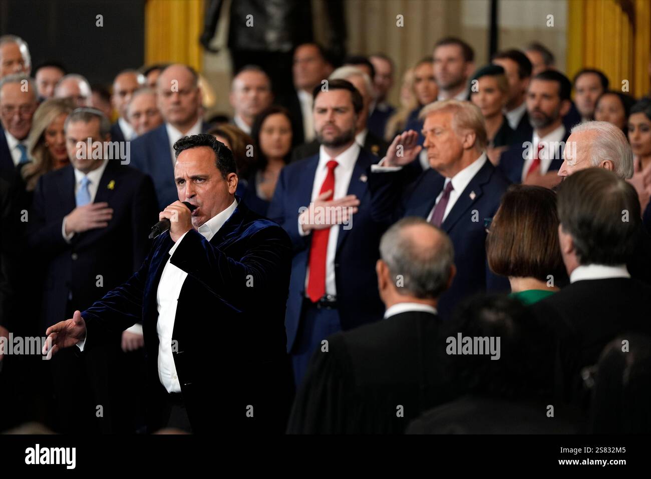 President Donald Trump and Vice President JD Vance listen to ...