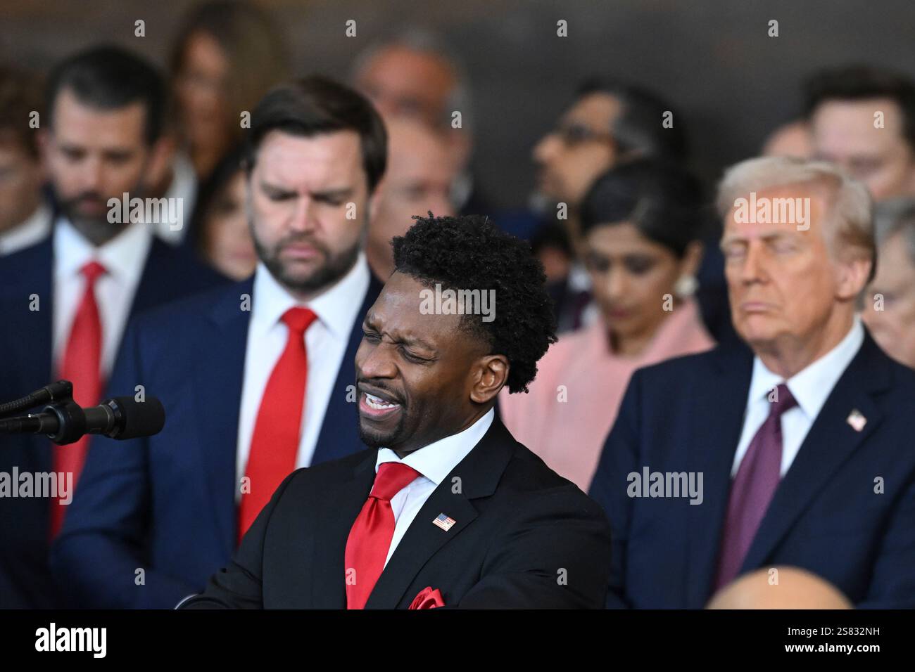 Pastor of 180 Church Lorenzo Sewell delivers a benediction after ...