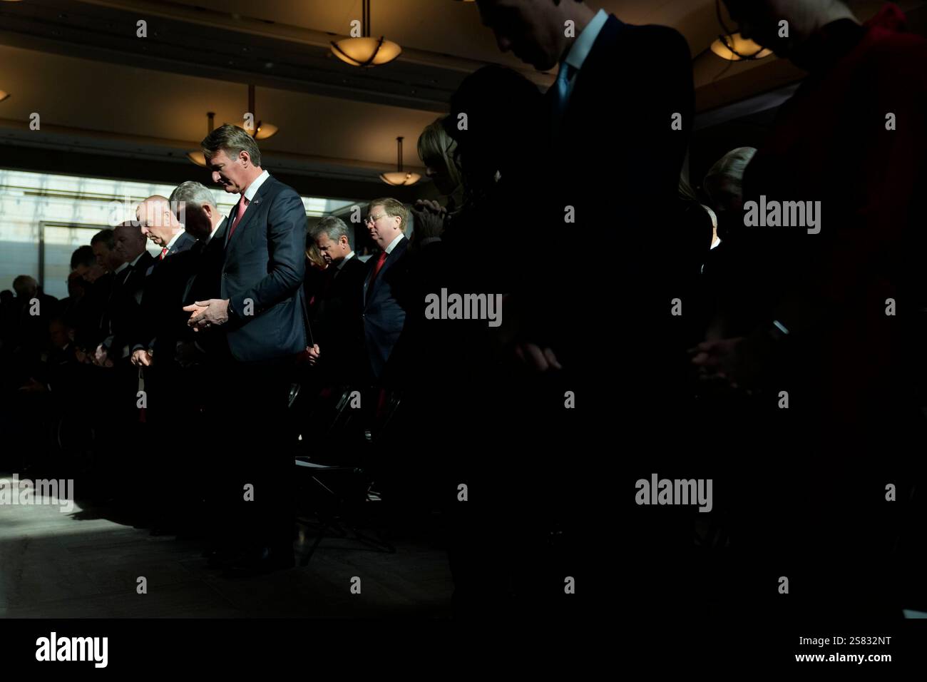 Guests and supporters are seen in an overflow room for President-elect ...