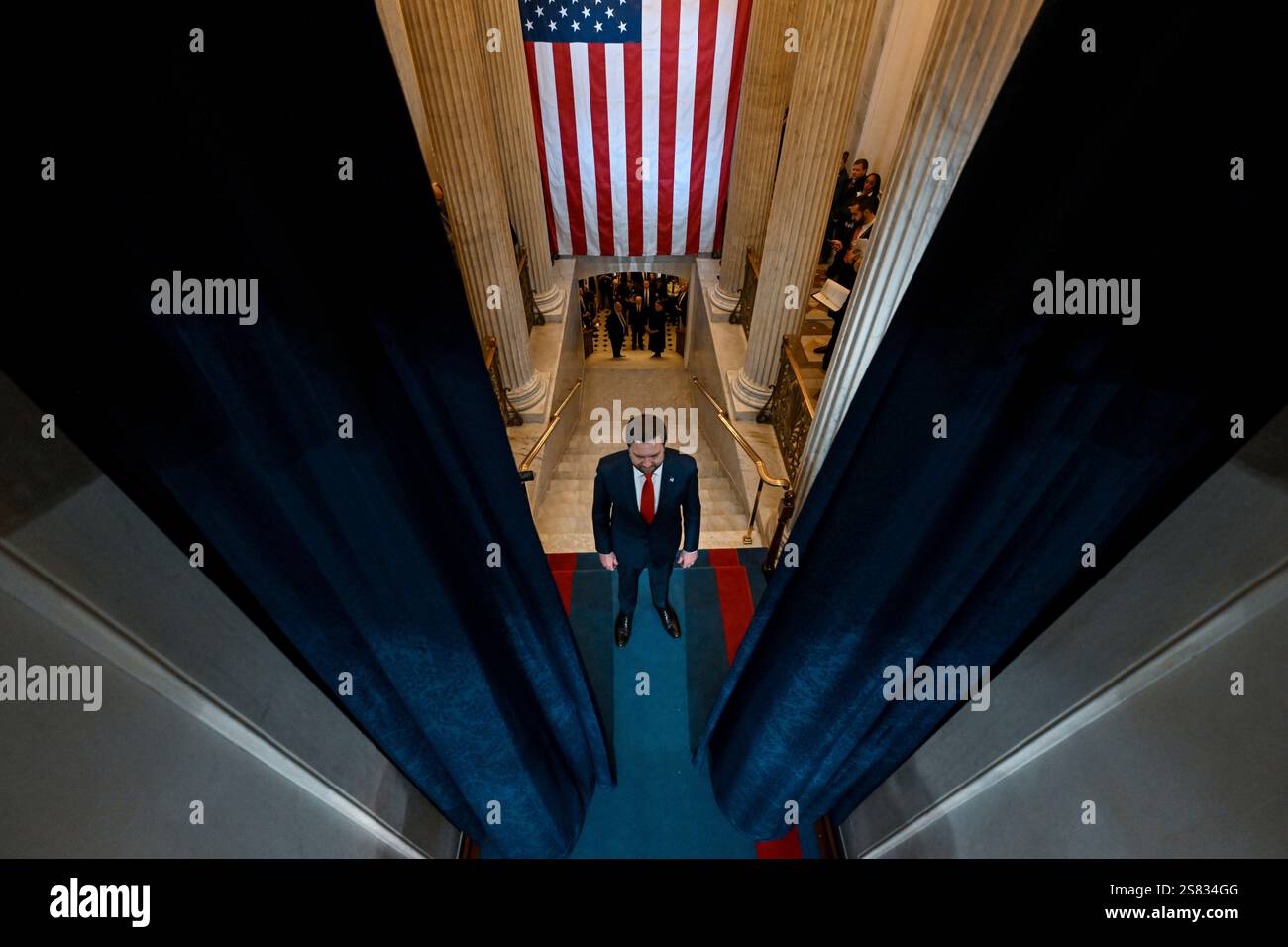 NYTINAUG25 -- Vice President-elect JD Vance entering the stage as the ...