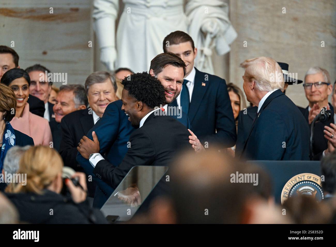 Vice President JD Vance embraces Senior Pastor Lorenzo Sewell during ...