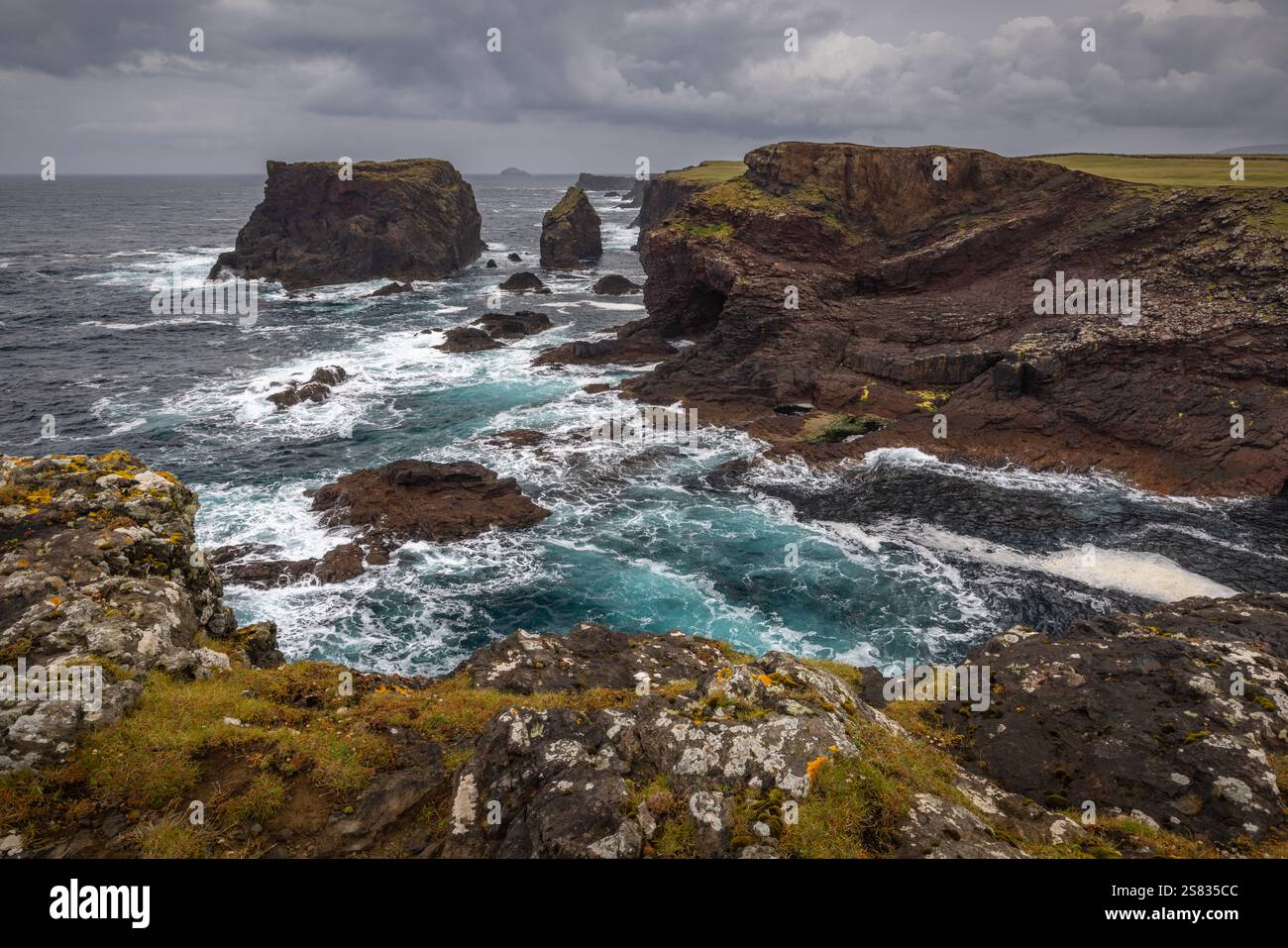 A storm over the volcanic cliffs of Eshaness, Shetland, Scotland ...