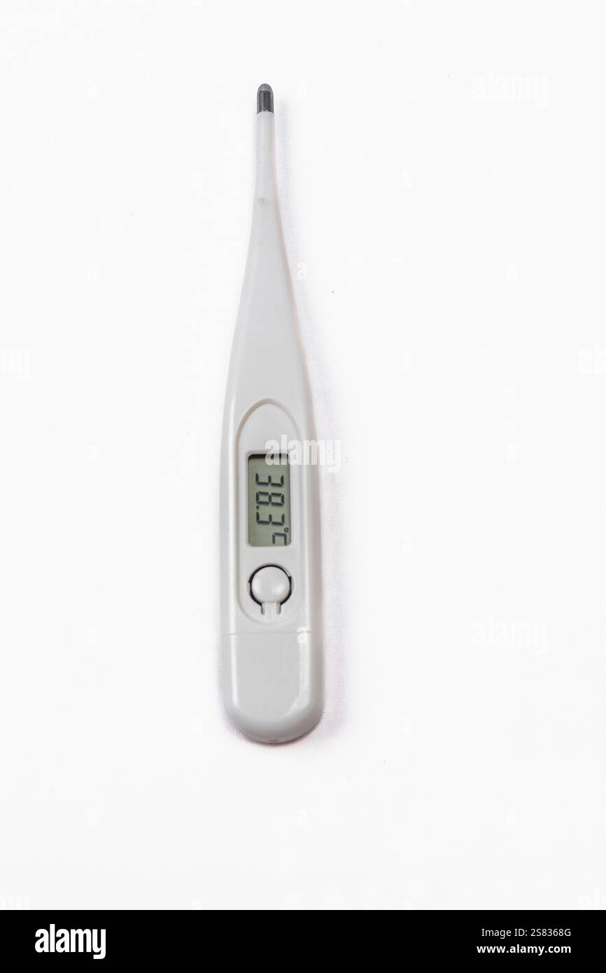 A vertical digital thermometer with an LCD screen showing a temperature ...