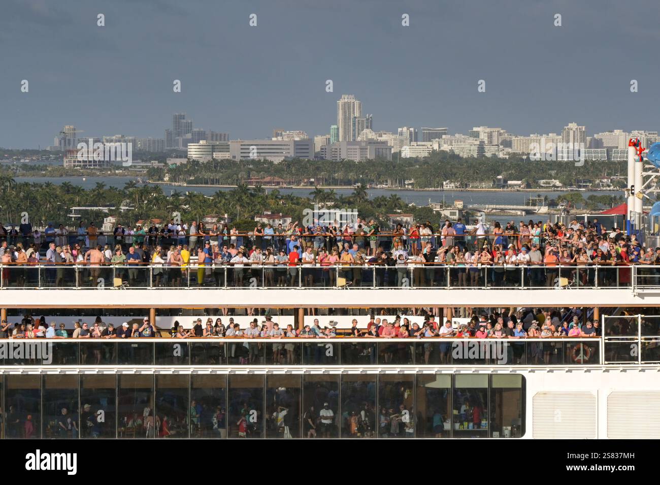 Miami, Florida, USA - 4 January 2025: Crowd of people on the decks of ...