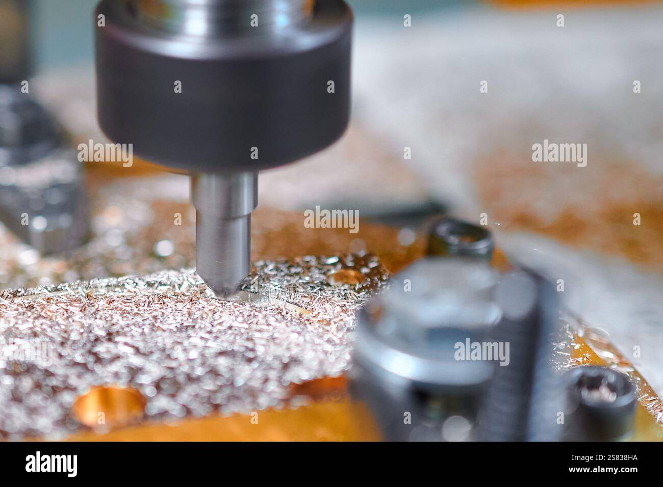 Precision milling machine crafting intricate details for clockwork ...