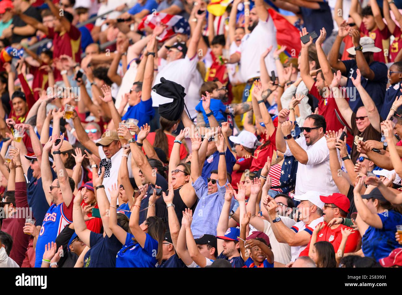 FT. LAUDERDALE, FL - JANUARY 18: Fans do the wave in the stands during ...