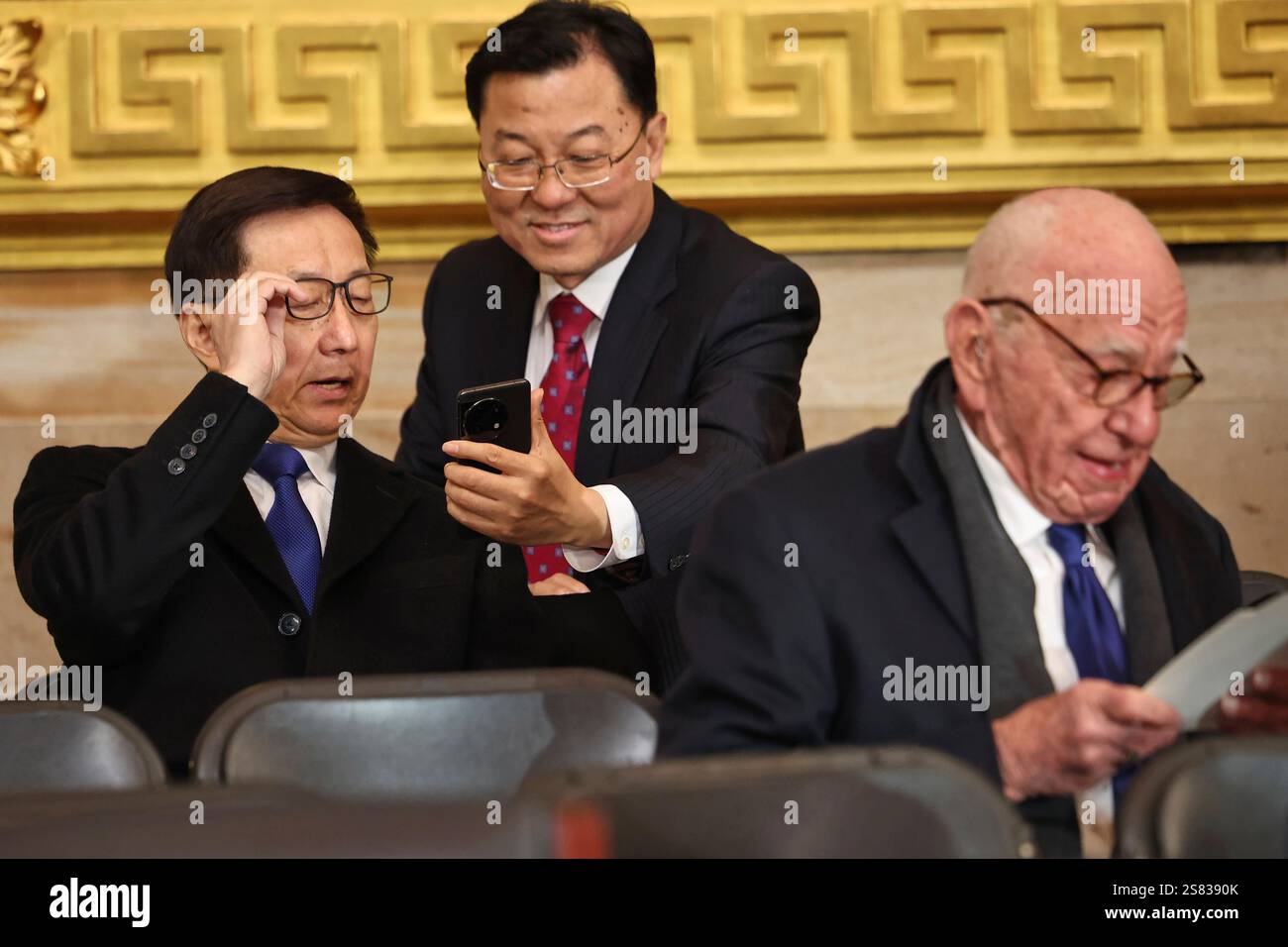 Chinese Vice President Han Zheng, left, and Rupert Murdoch, right, sit ...