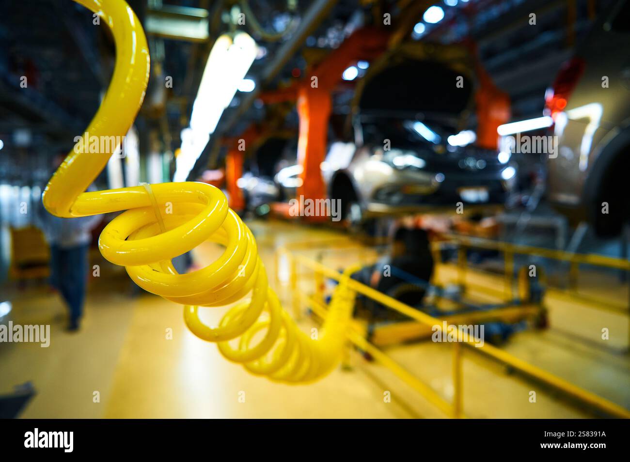 Yellow plastic compressed air hose for working pneumatic tools ...