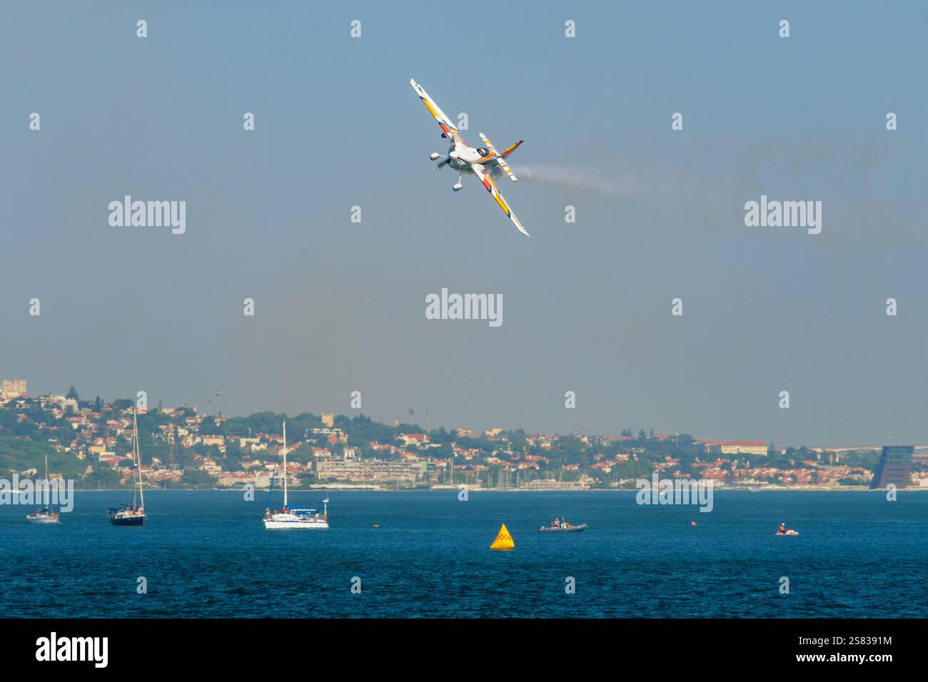 Stunt aerobatic plane performing stunts in air Stock Photo - Alamy