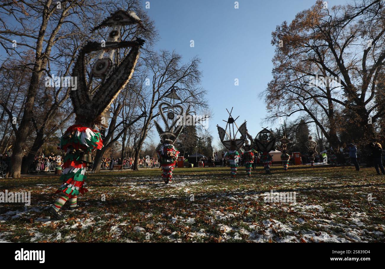 People called parade in masks and costumes, perform ritual dances to ...