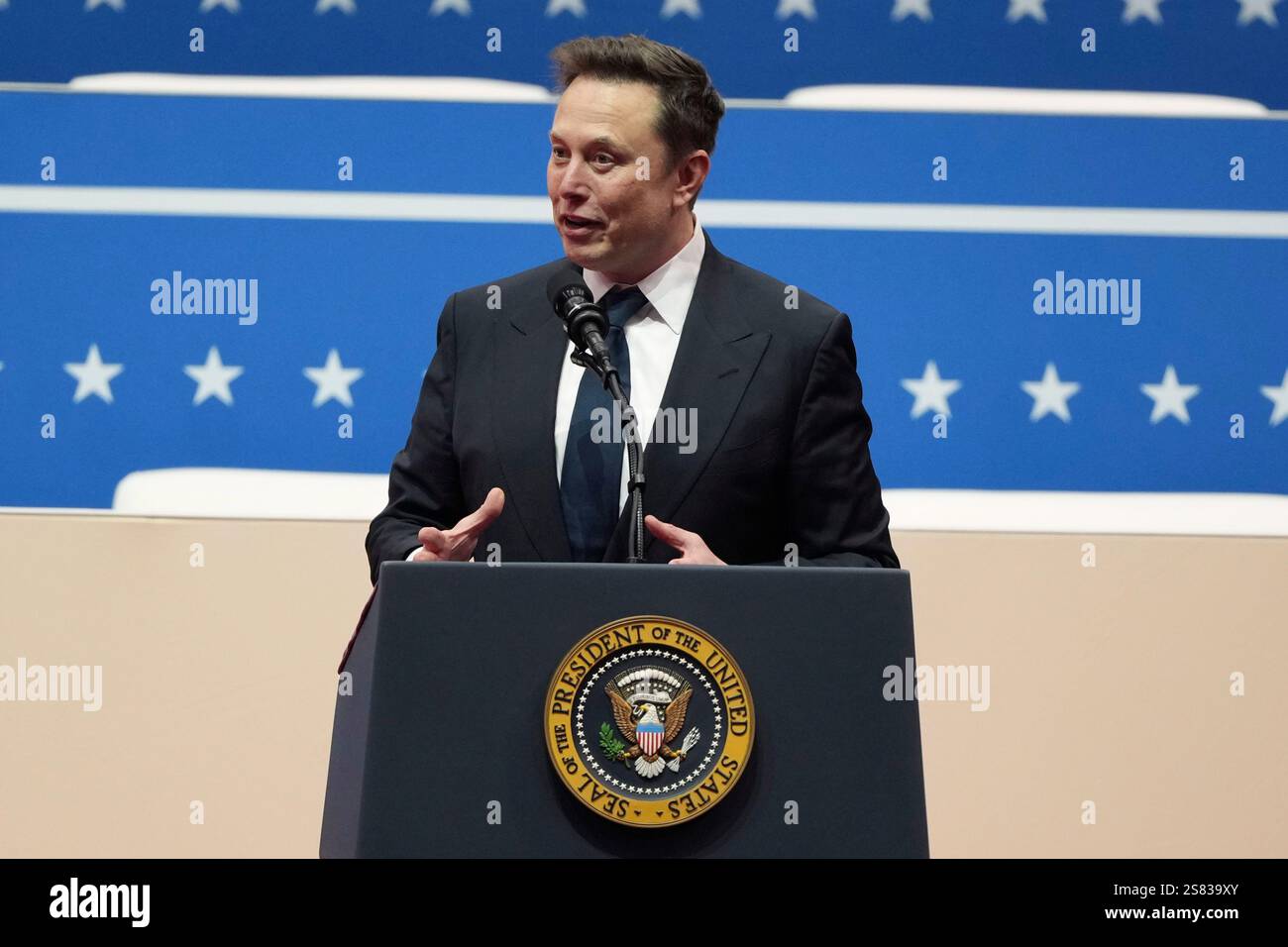 Elon Musk speaks at an indoor Presidential Inauguration parade event in ...