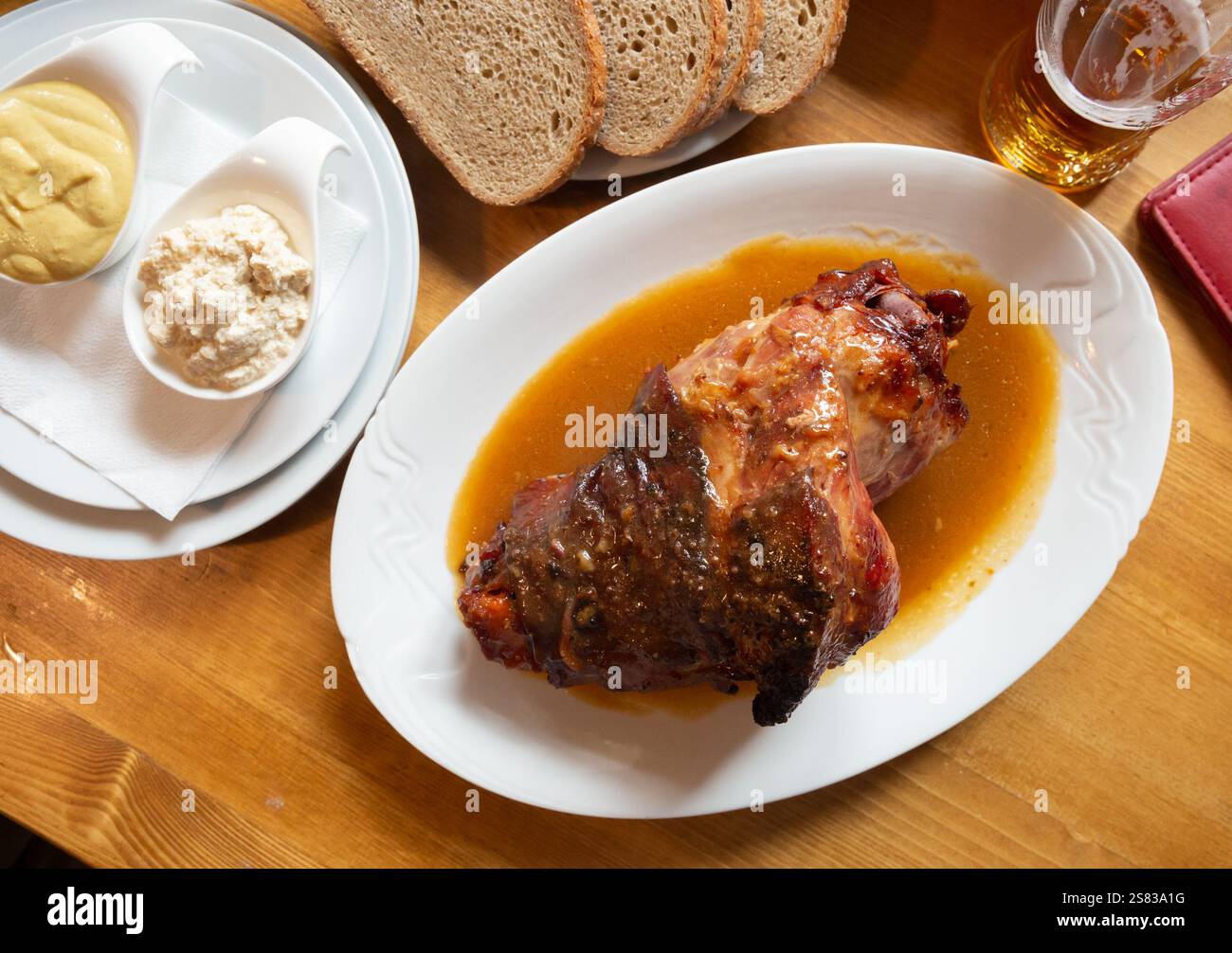 Delicious grilled knuckle of pork with horseradish and mustard Stock ...