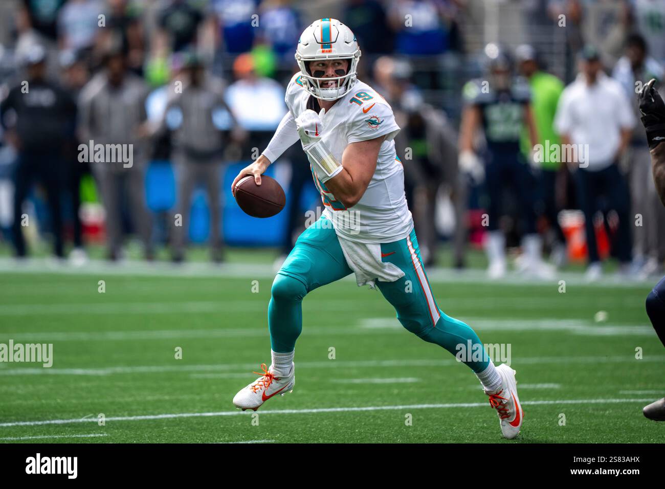 Miami Dolphins quarterback Skylar Thompson scrambles during an NFL ...