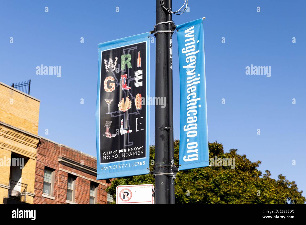 A Wrigleyville sign outside of Wrigley Field displaying the north side ...