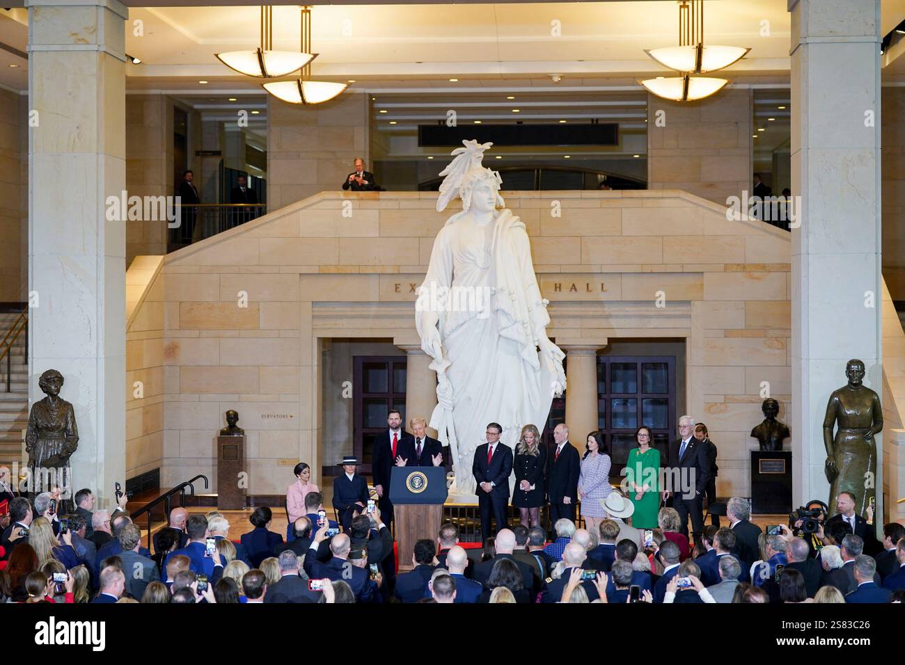 US President Donald Trump, center, speaks during the 60th presidential ...
