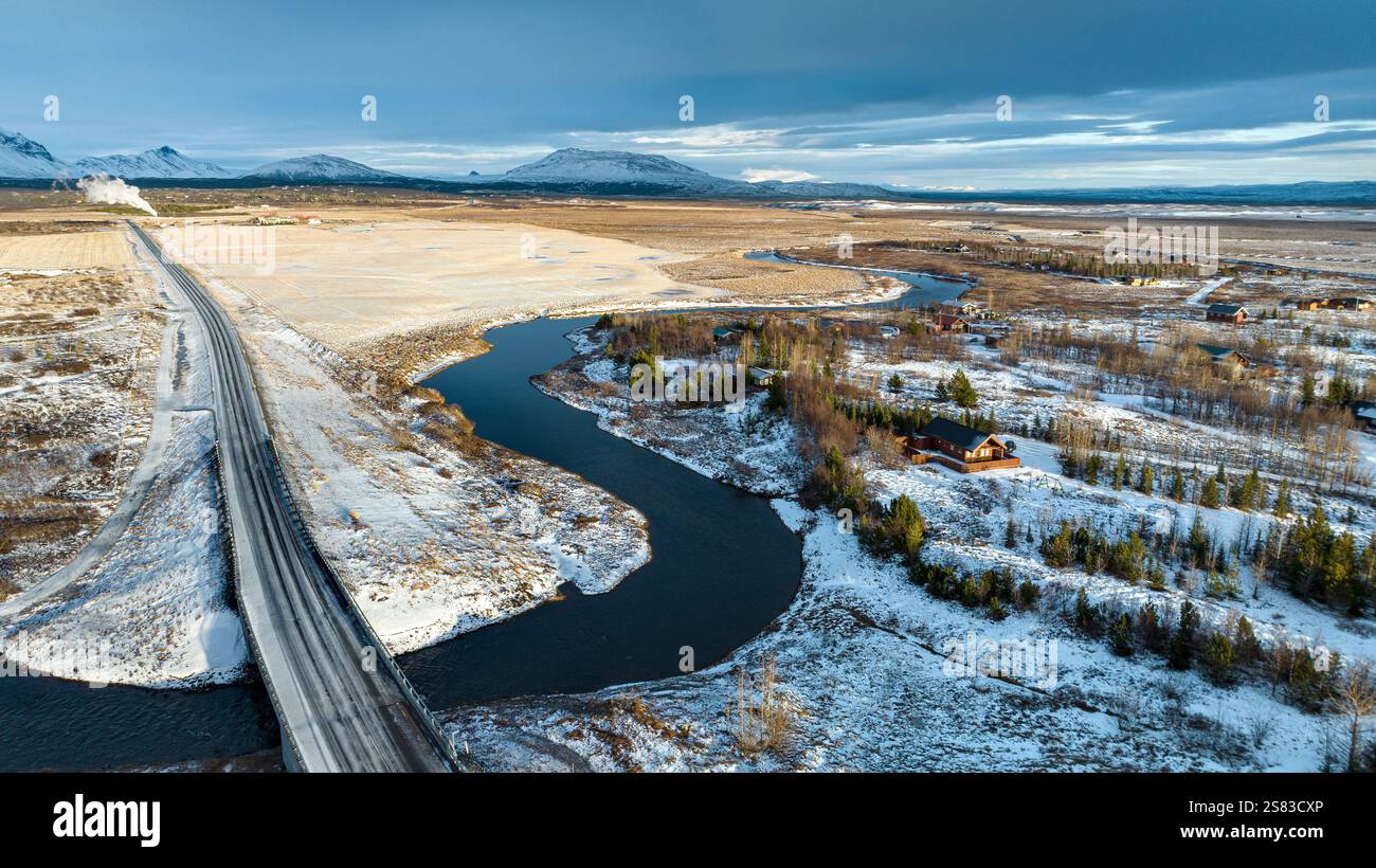 A bend in a river in south Iceland, winter landscape, aerial view of a ...